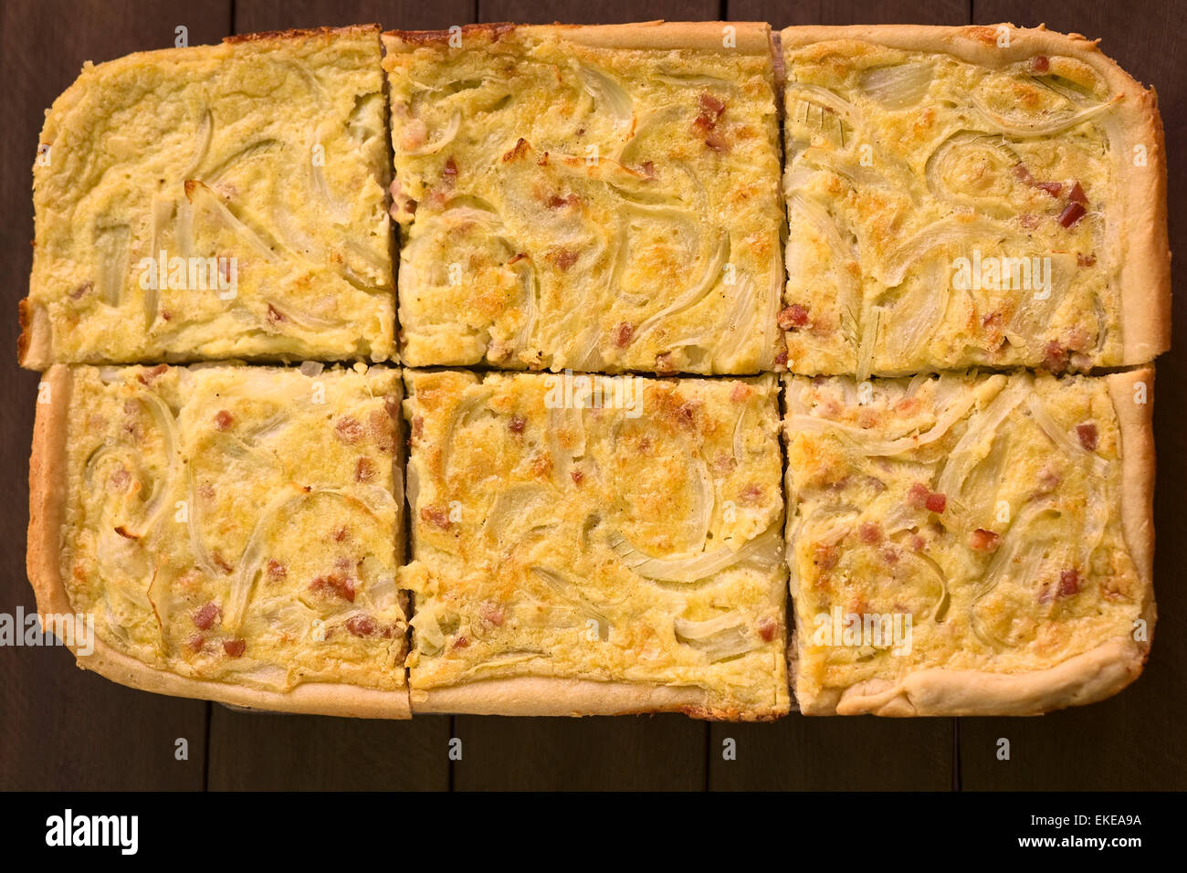 Pieces of traditional German Zwiebelkuchen or onion cake, made of a ...