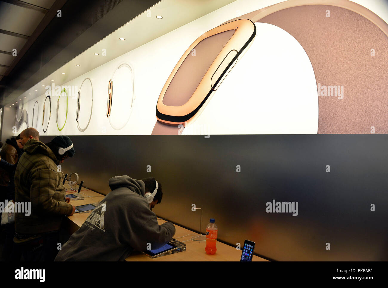 New York, USA. 9th Apr, 2015. Customers test Apple products at Apple ...
