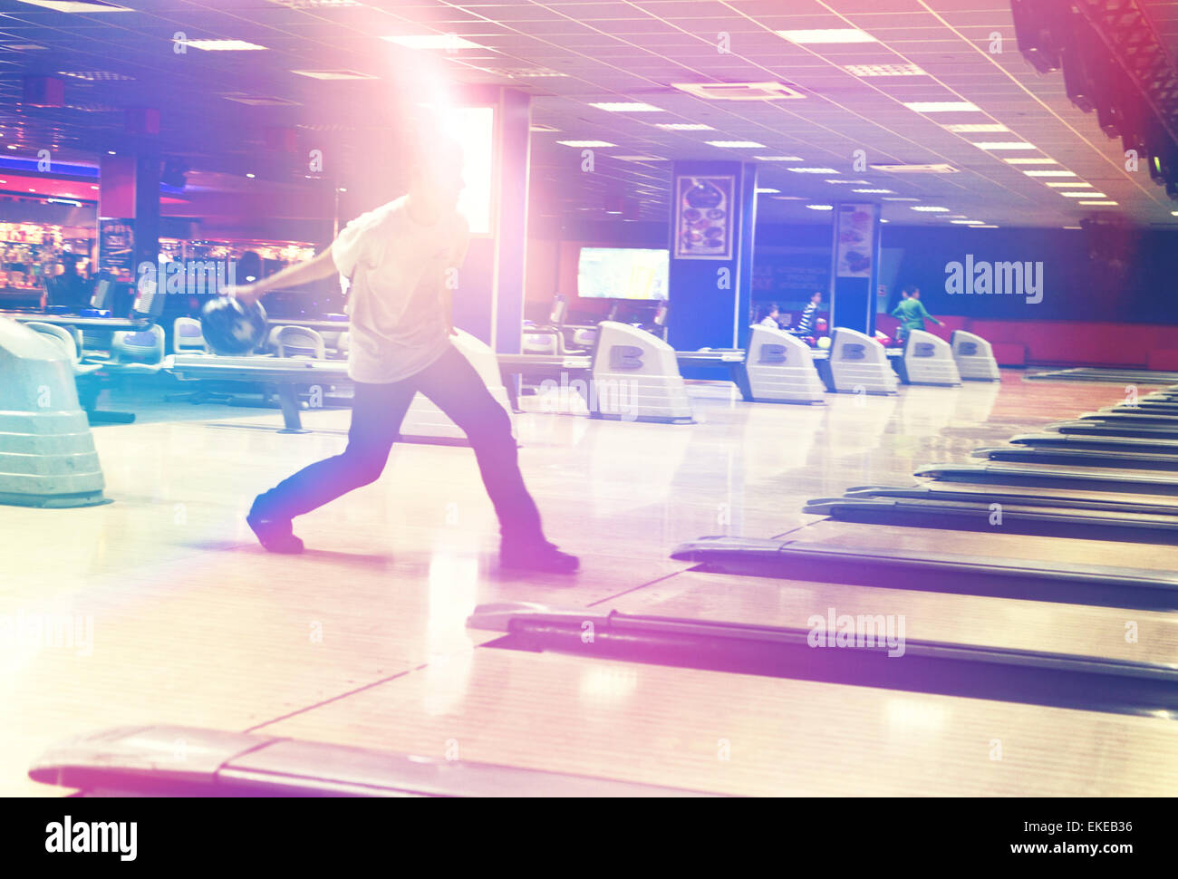 teen boy plays bowling Stock Photo - Alamy