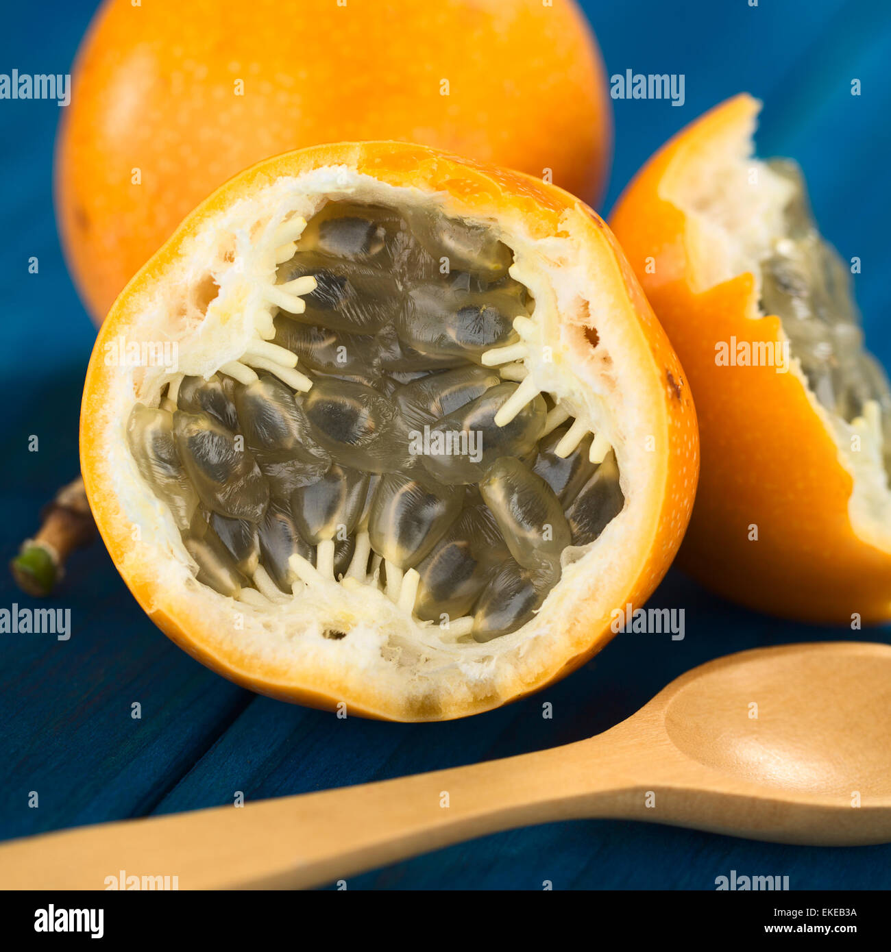 Sweet granadilla or grenadia (lat. Passiflora ligularis) fruit cut in ...