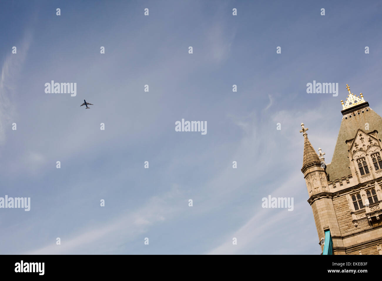 Plane flying over the Tower bridge of London Stock Photo - Alamy