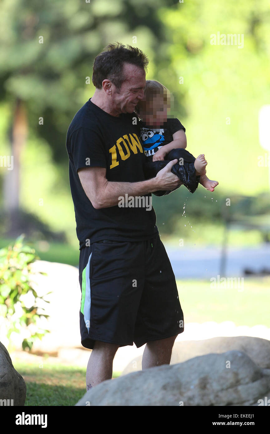 Tom Arnold and Breckin Meyer bump into each other at a park in Los ...