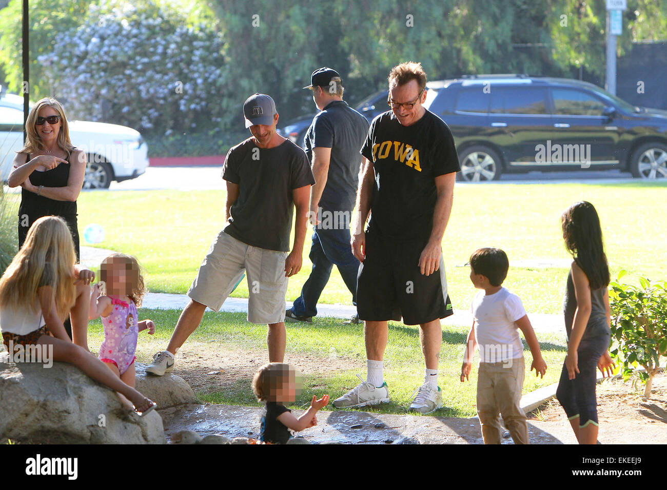 Tom Arnold and Breckin Meyer bump into each other at a park in Los ...