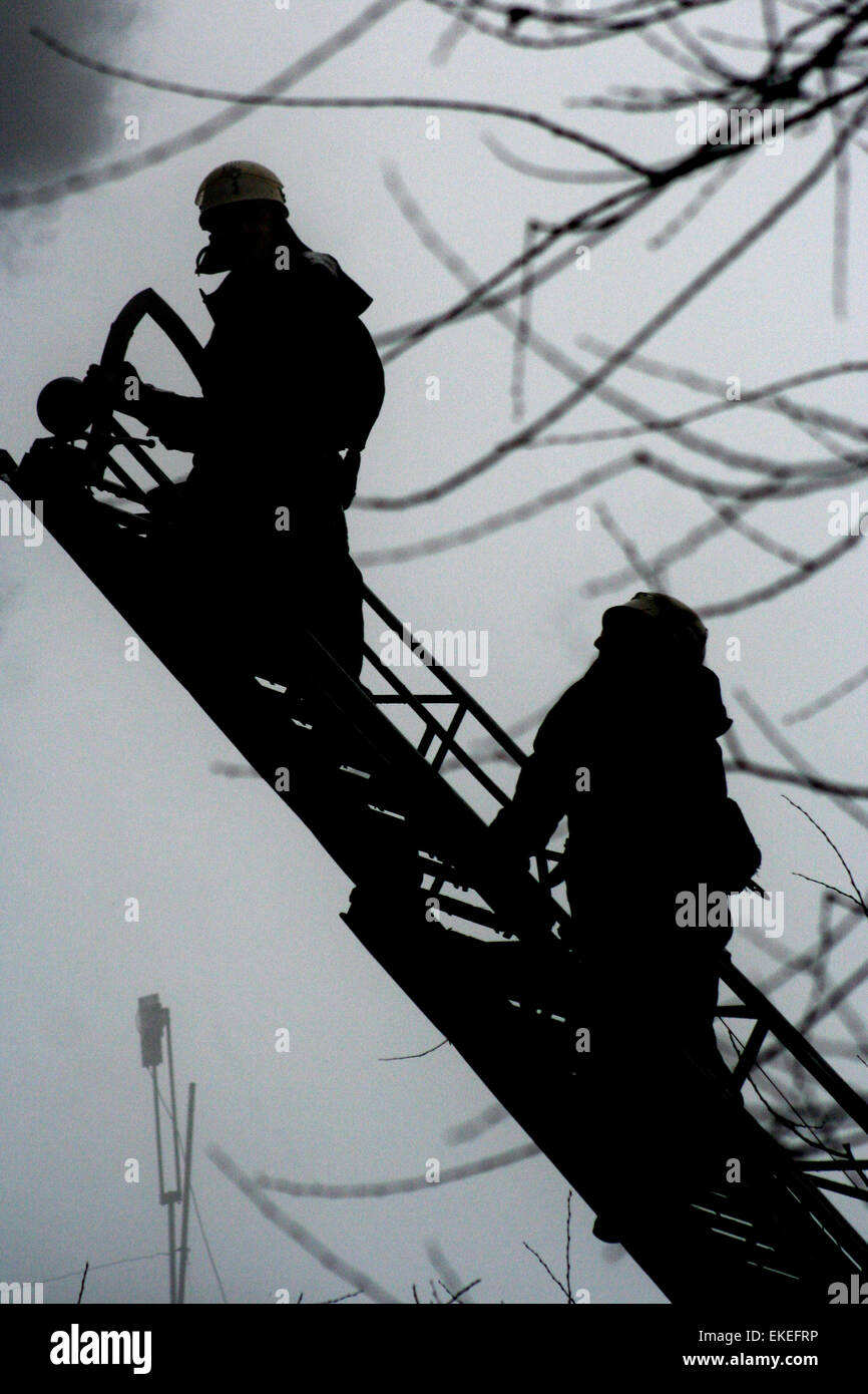 fireman wearing a gas mask on the stairs Stock Photo - Alamy