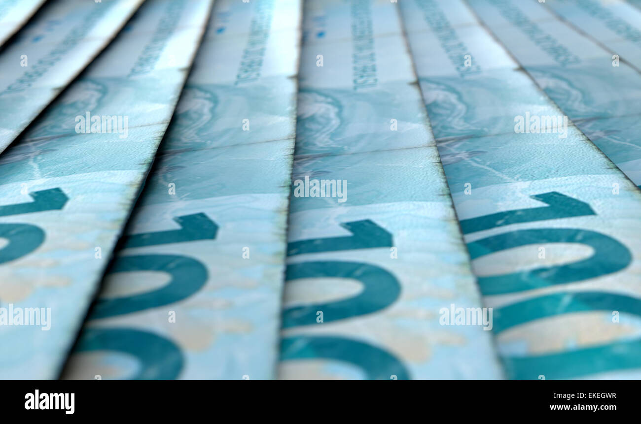 A macro close-up view showing the detail of brazilian real banknotes ...