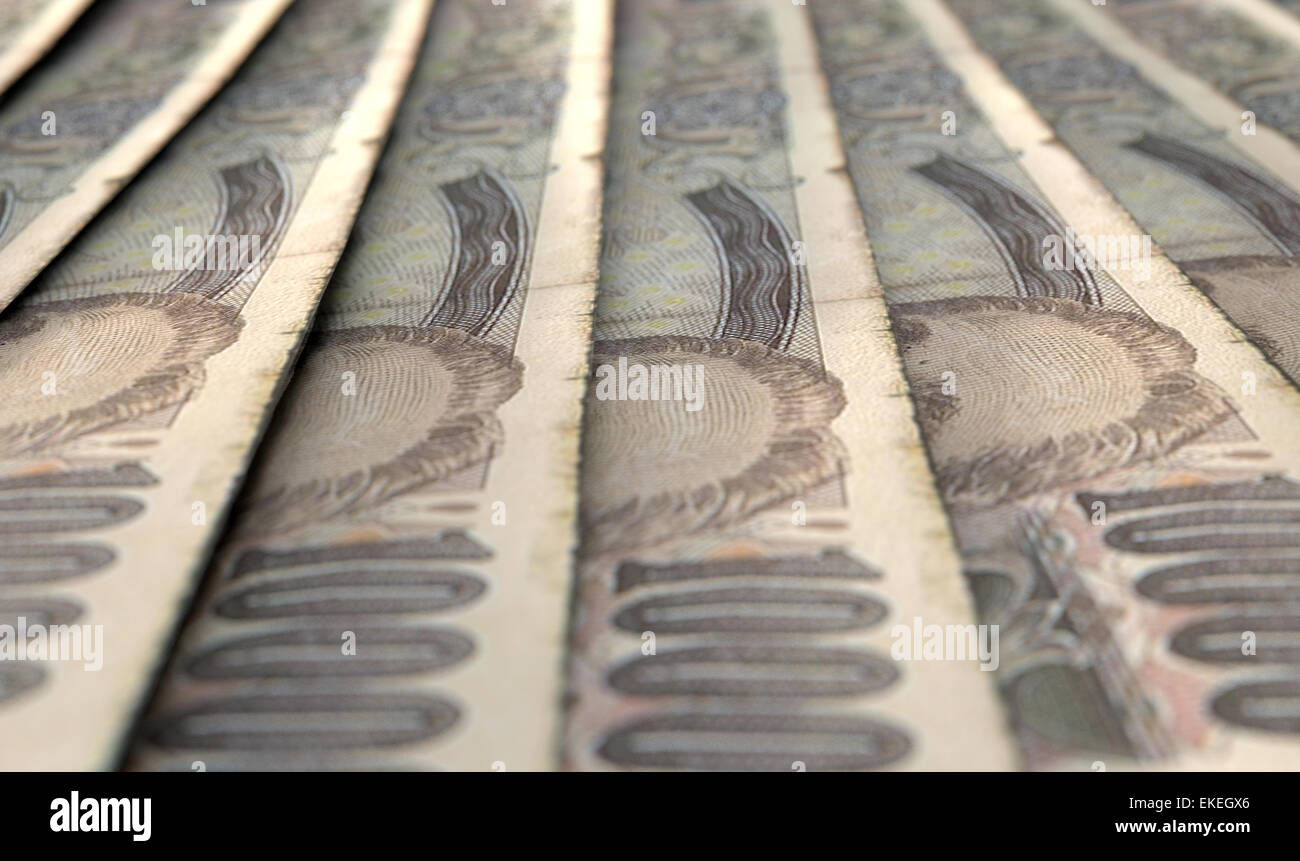 A macro close-up view showing the detail of japanese yen banknotes laid ...