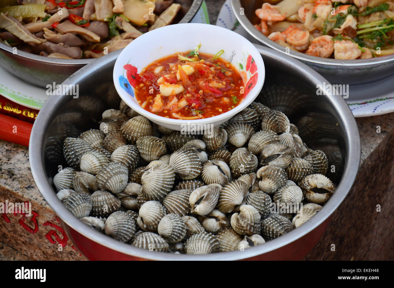 Steamed Blood cockle Shell Sacrificial offering Stock Photo - Alamy
