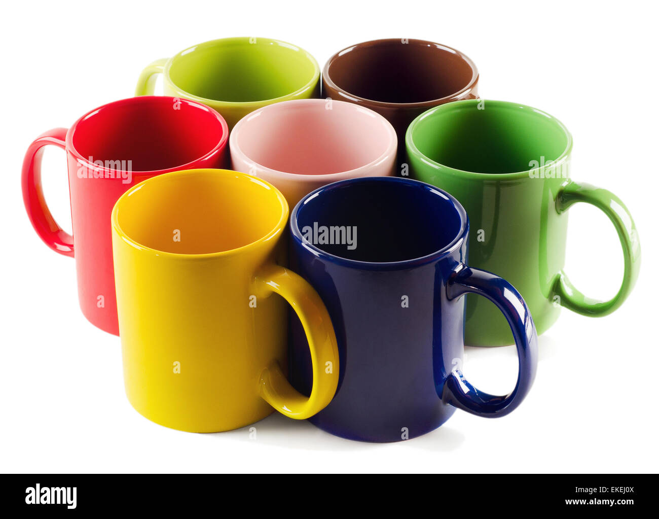 Colorful mugs on isolated a white background Stock Photo - Alamy