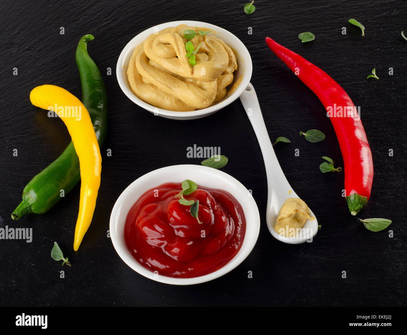 tomato and mustard sauce with red and green peppers Stock Photo - Alamy