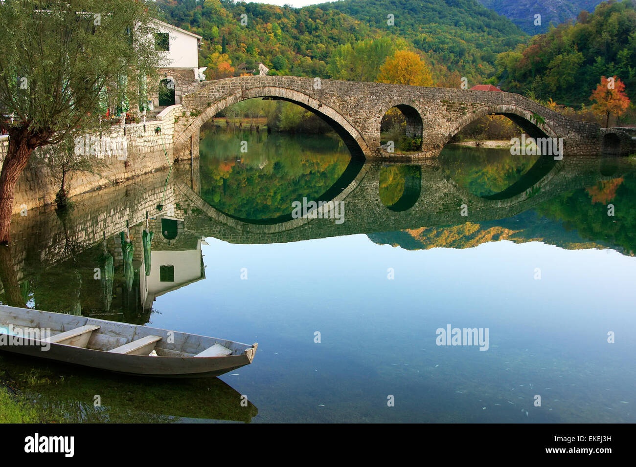 Arched bridge reflected in Crnojevica river, Montenegro, Balkans Stock Photo - Alamy