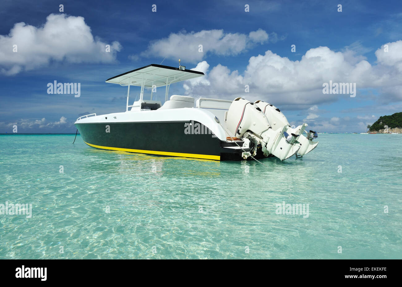 Beautiful beach with motor boat Stock Photo - Alamy