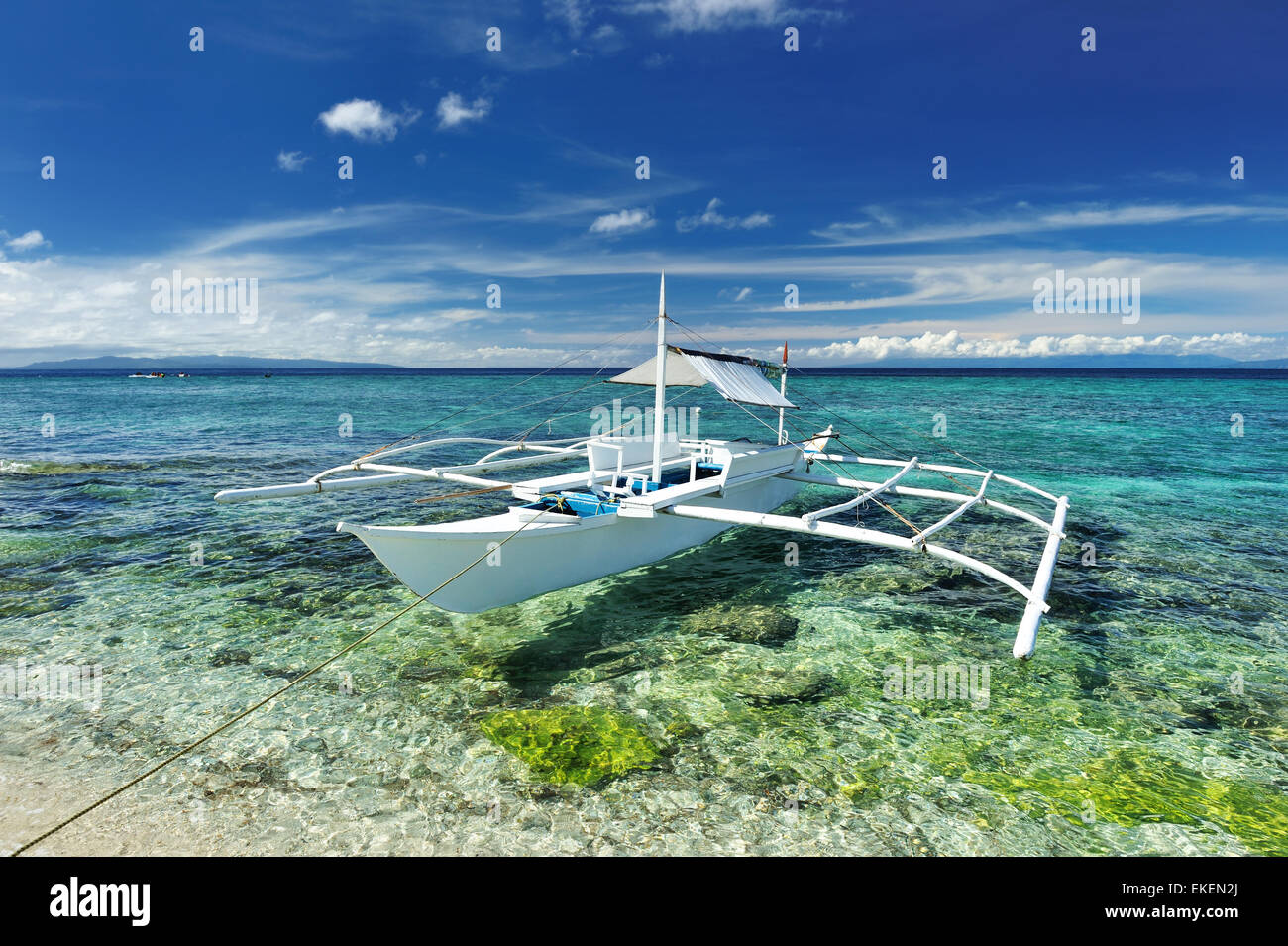 Beautiful beach with boat Stock Photo - Alamy