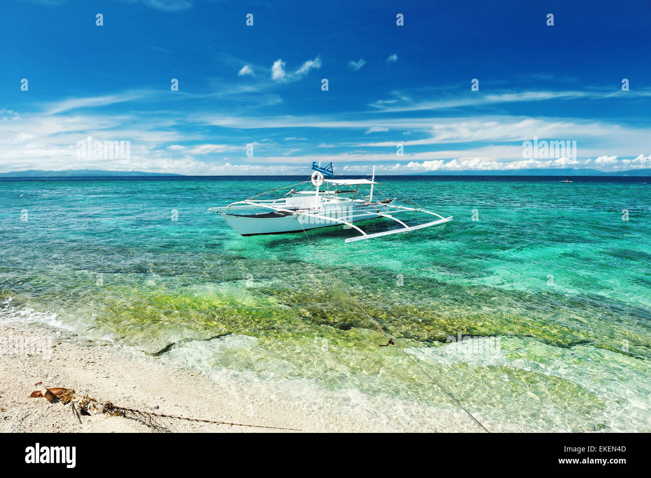 Beautiful beach with boat Stock Photo - Alamy