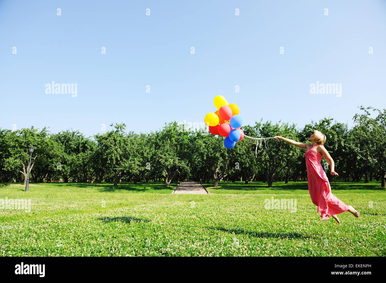 Flying with balloons Stock Photo - Alamy