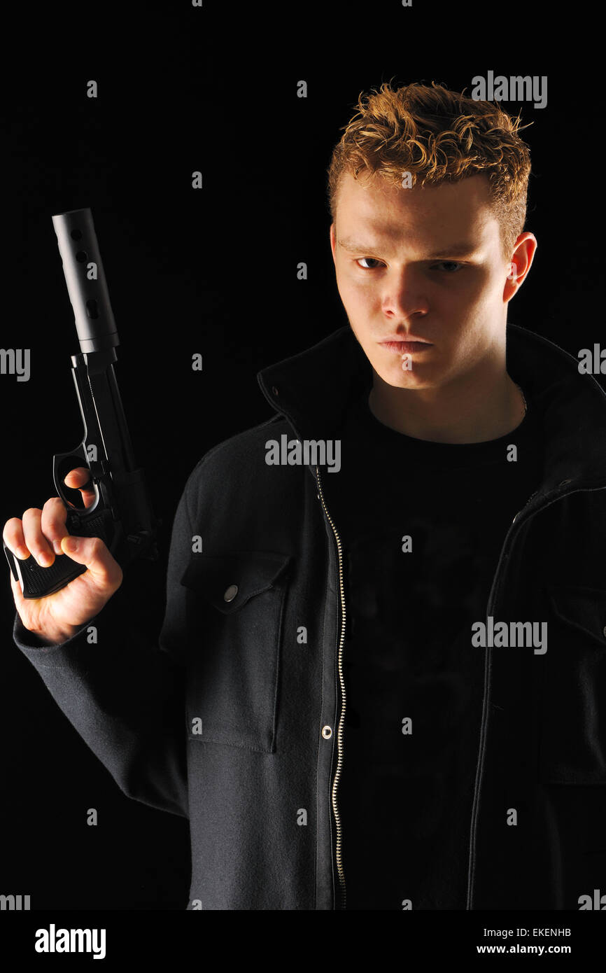 Man with gun Stock Photo - Alamy
