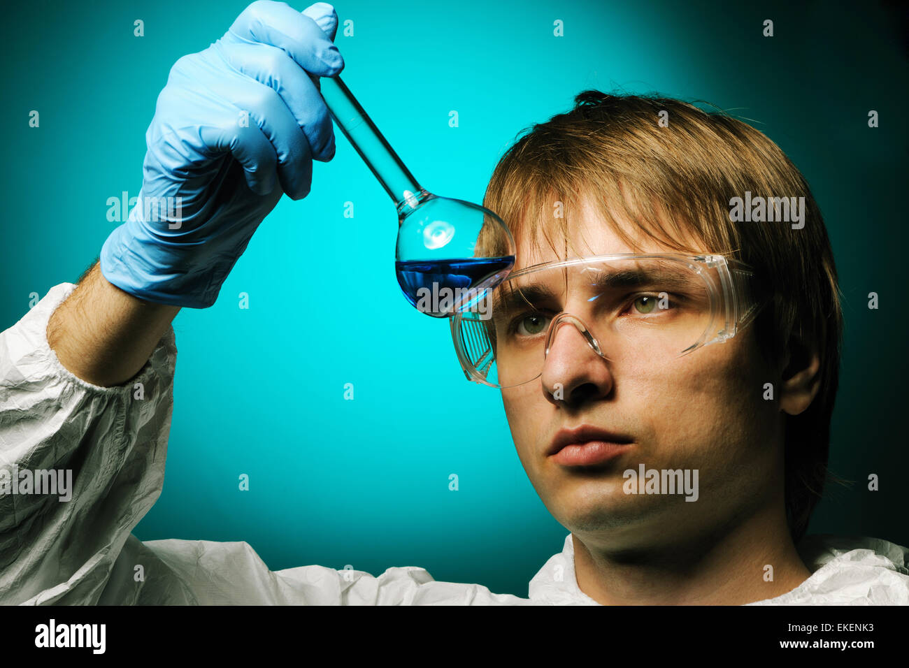 Scientist protection suit looking hi-res stock photography and images ...