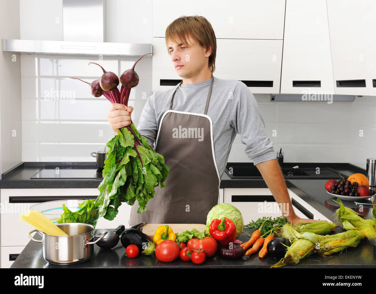 Man in kitchen Stock Photo - Alamy