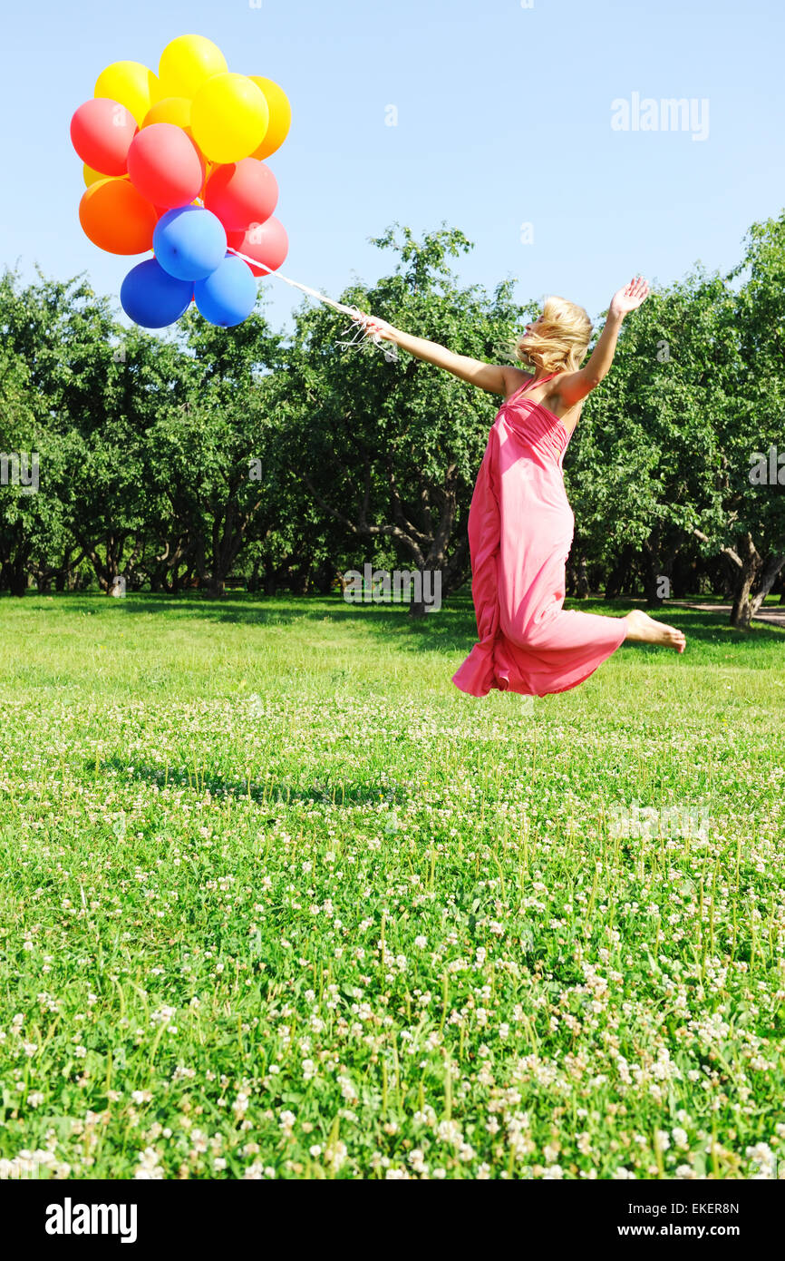 Flying with balloons Stock Photo - Alamy