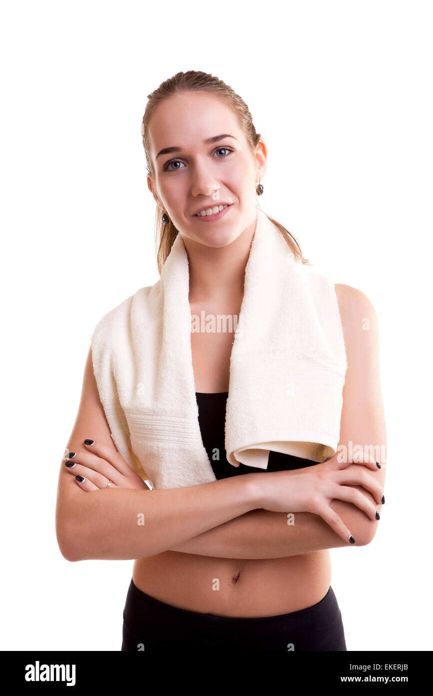 Slim girl with perfect body smiling at the camera with a towel on ...