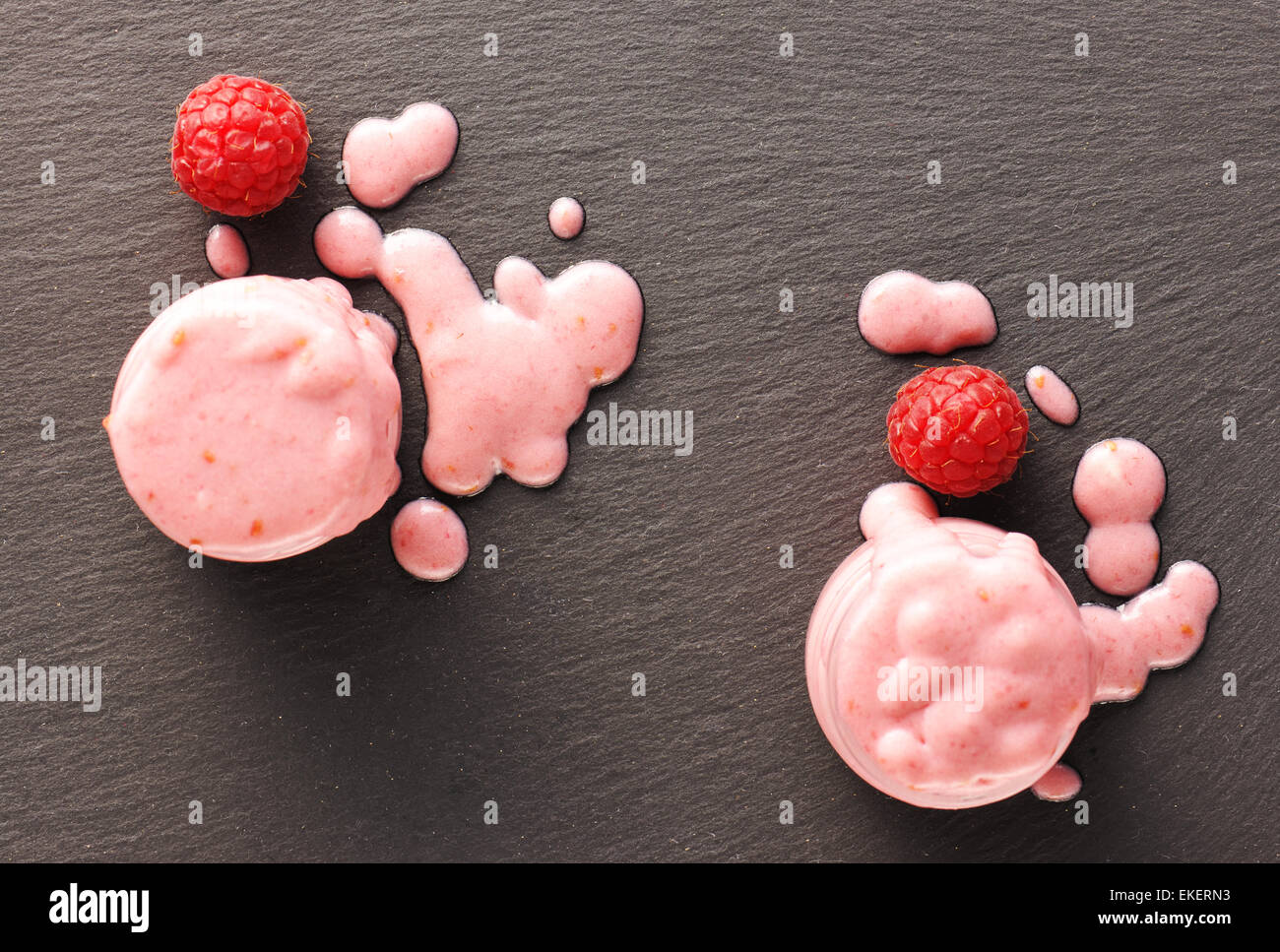 Fresh yogurt with raspberry Stock Photo - Alamy