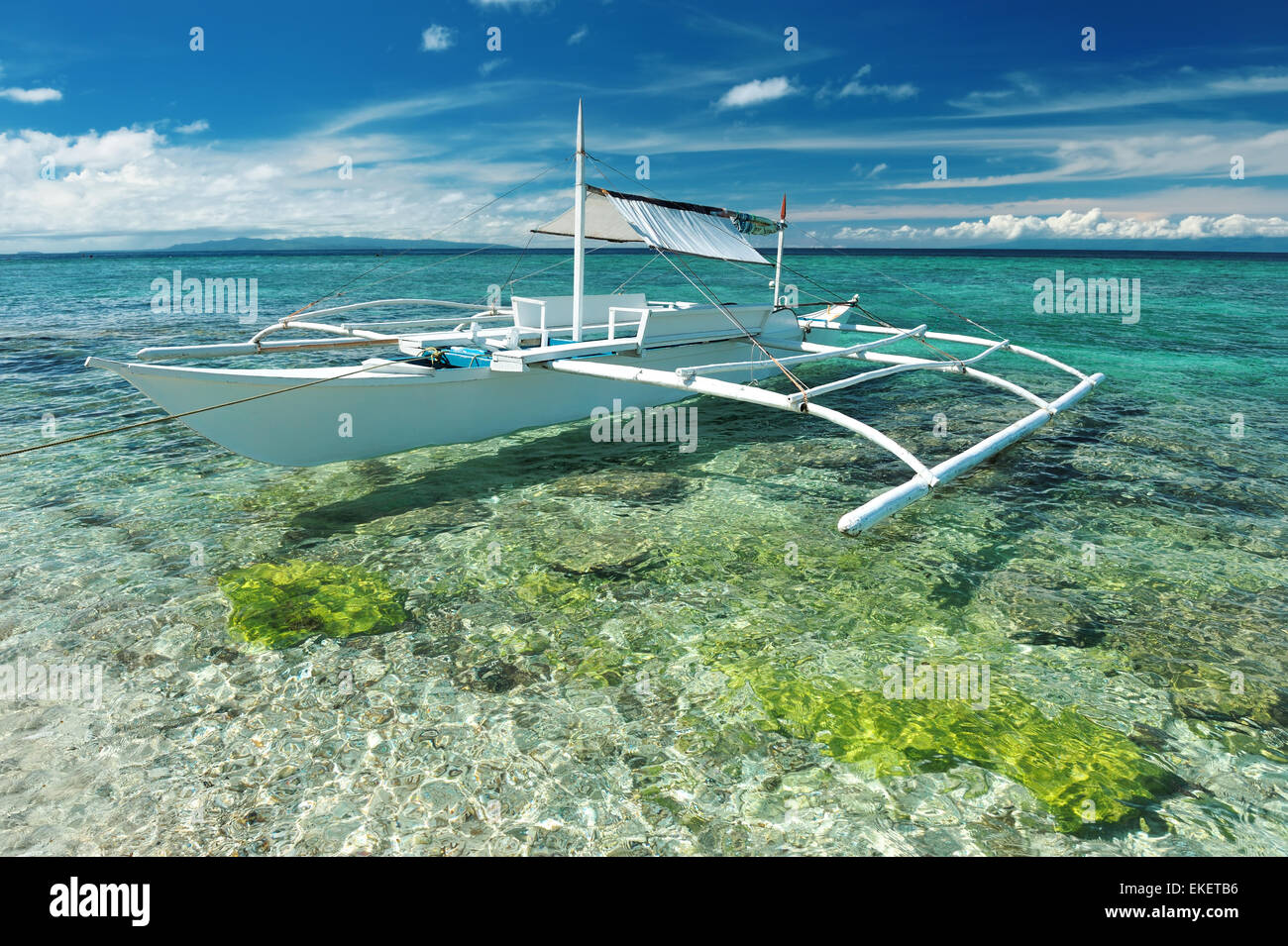 Beautiful beach with boat Stock Photo - Alamy