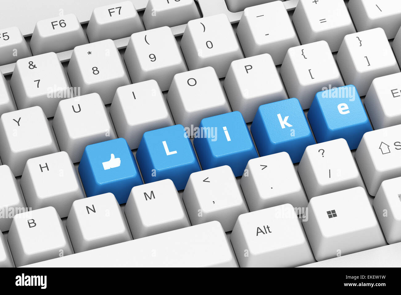 Keyboard with blue Like buttons Stock Photo - Alamy