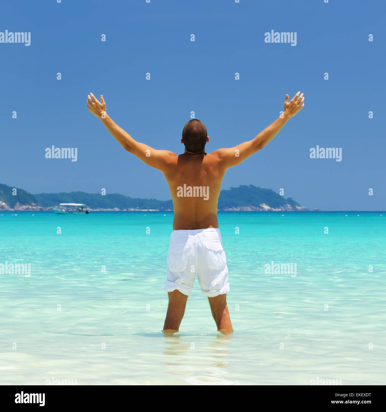 Man at beach Stock Photo - Alamy