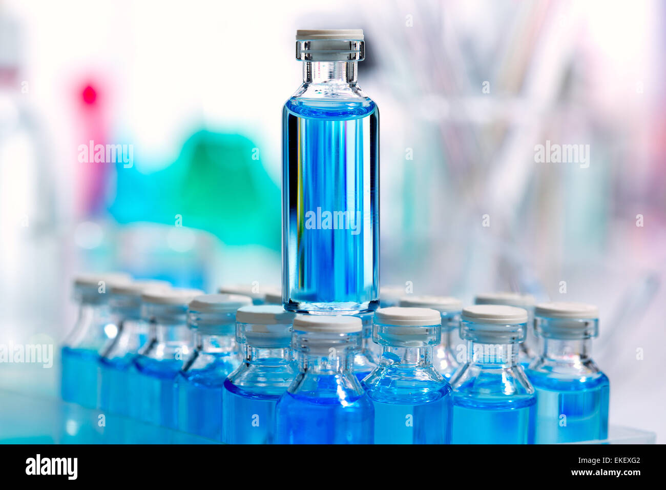 Chemical scientific laboratory blue glass bottles Stock Photo - Alamy