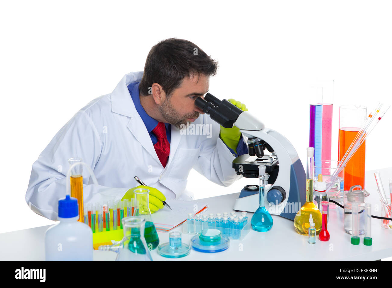 chemical laboratory scientist man looking microscope Stock Photo - Alamy