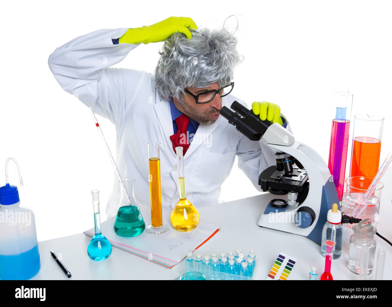 Crazy mad nerd scientist at laboratory microscope Stock Photo - Alamy
