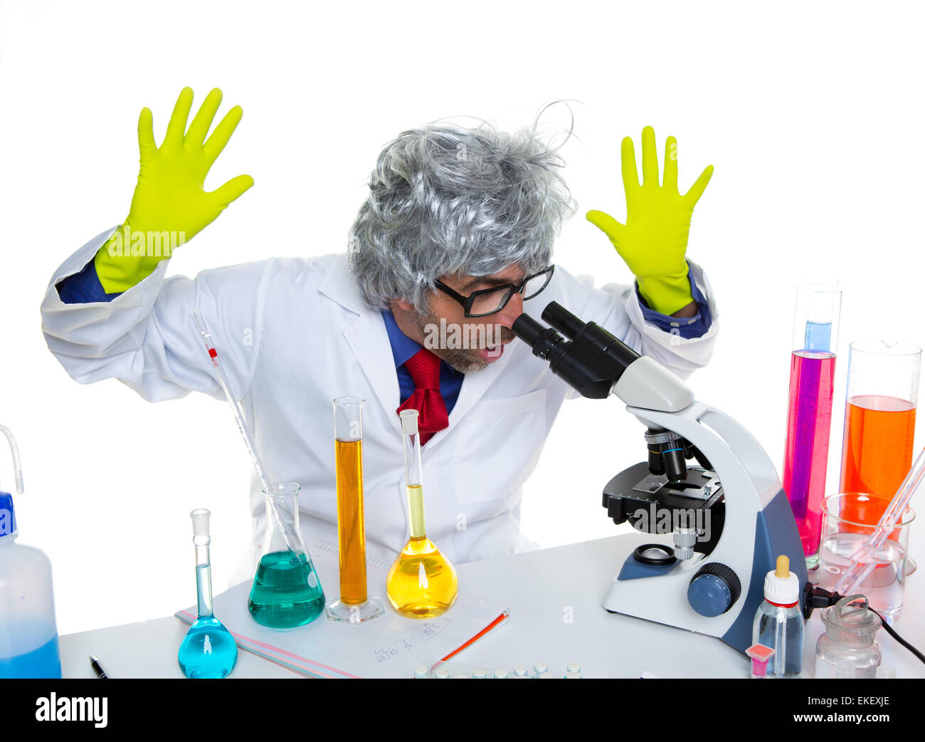 Crazy mad nerd scientist at laboratory microscope Stock Photo - Alamy