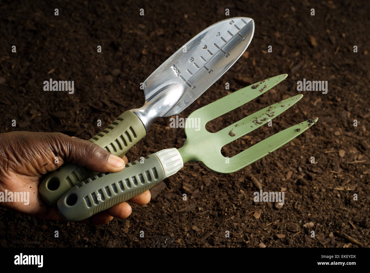 Gardening Tools with Soil Background Stock Photo - Alamy