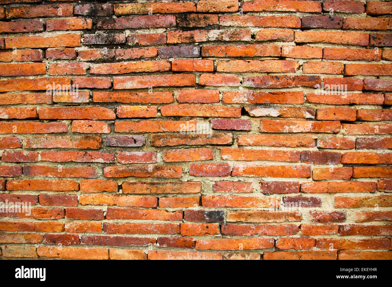 Destroyed brick wall for background Stock Photo - Alamy