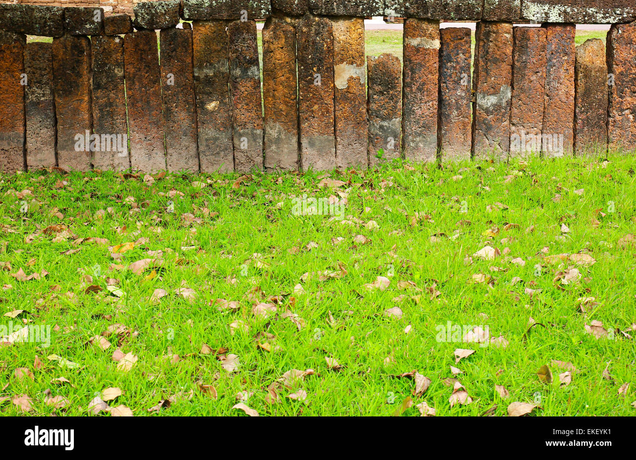 Stone block wall with green grass Stock Photo - Alamy