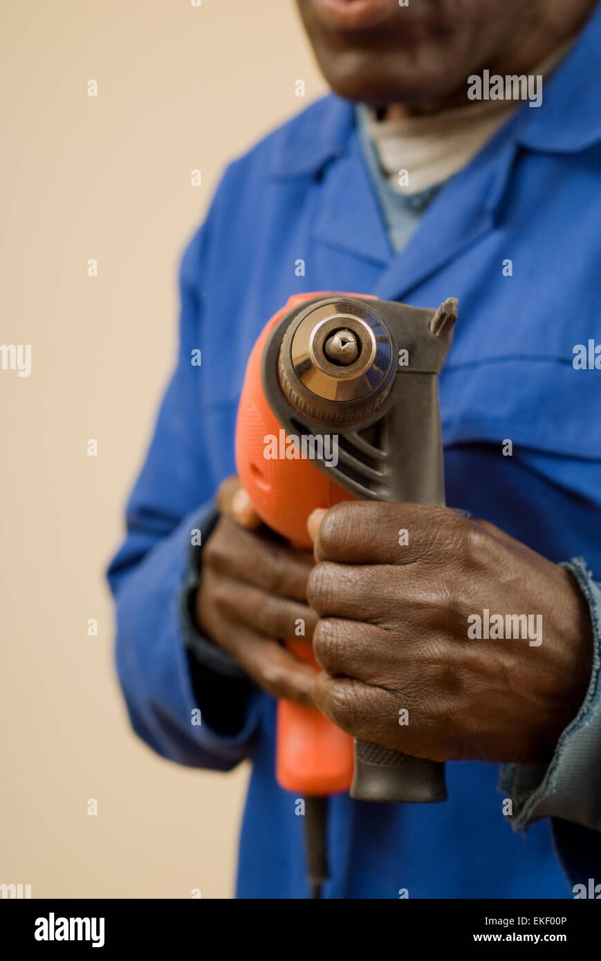 Construction Worker with Power Tool Stock Photo - Alamy