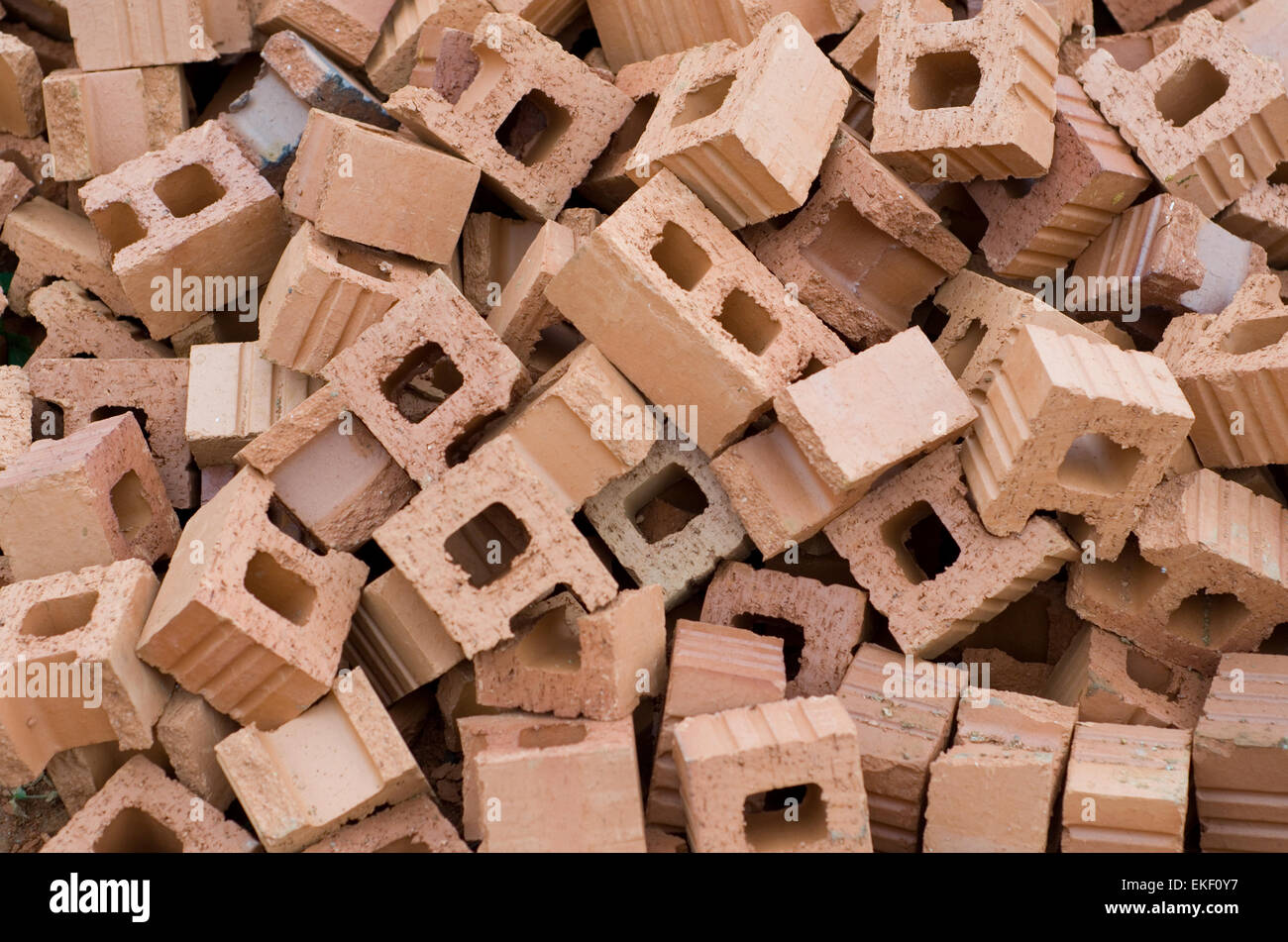 Pile of red bricks Stock Photo - Alamy