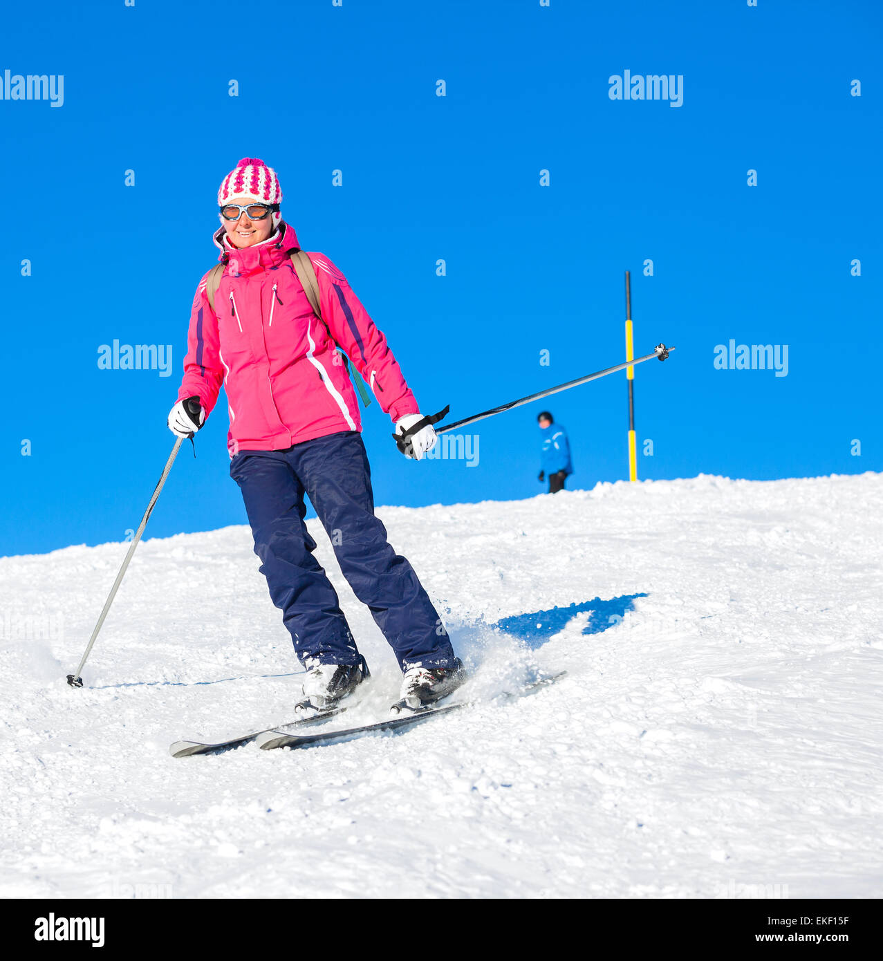 Young woman skiing Stock Photo - Alamy