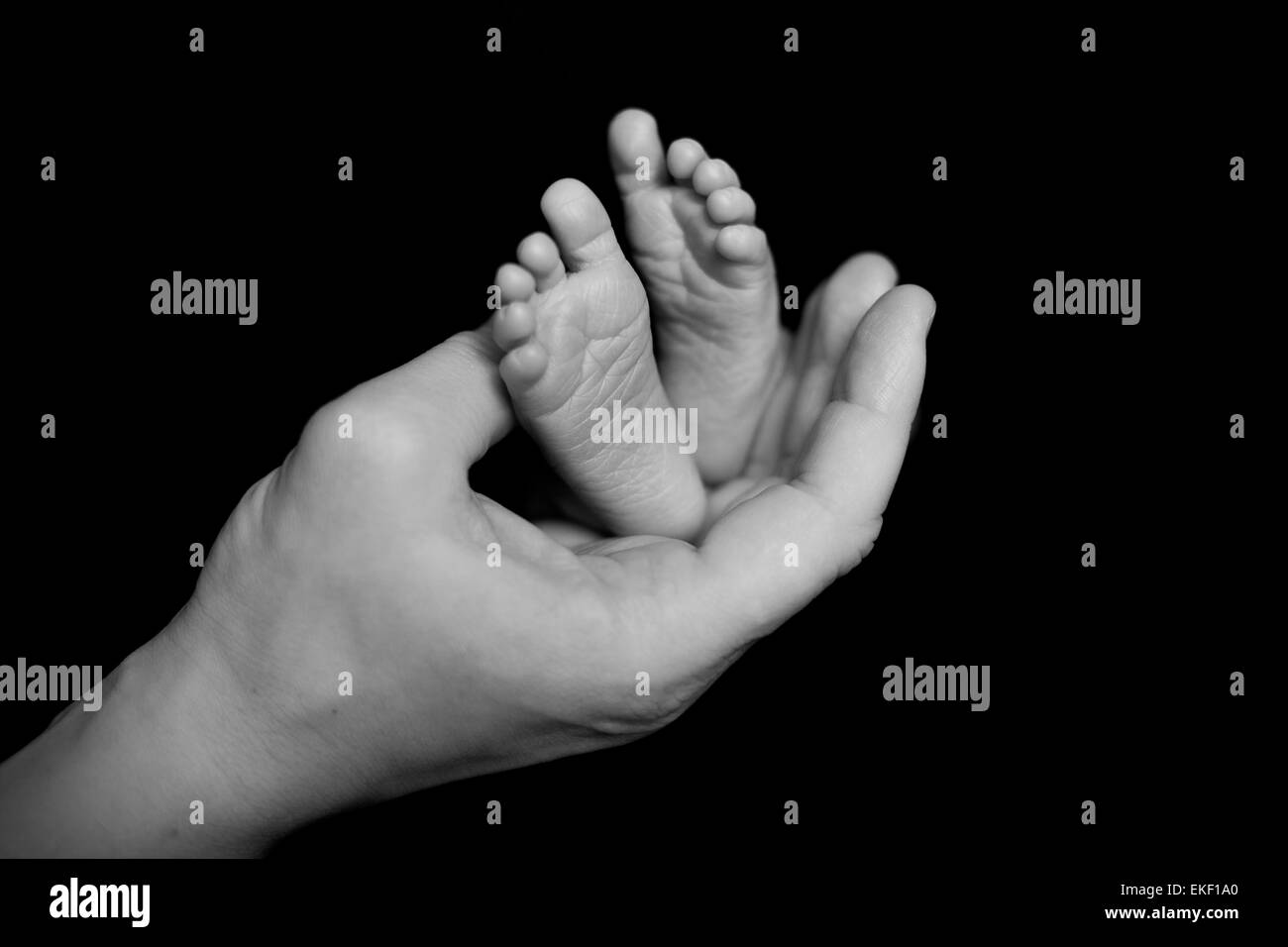 Hand on the leg Black and White Stock Photos & Images - Alamy