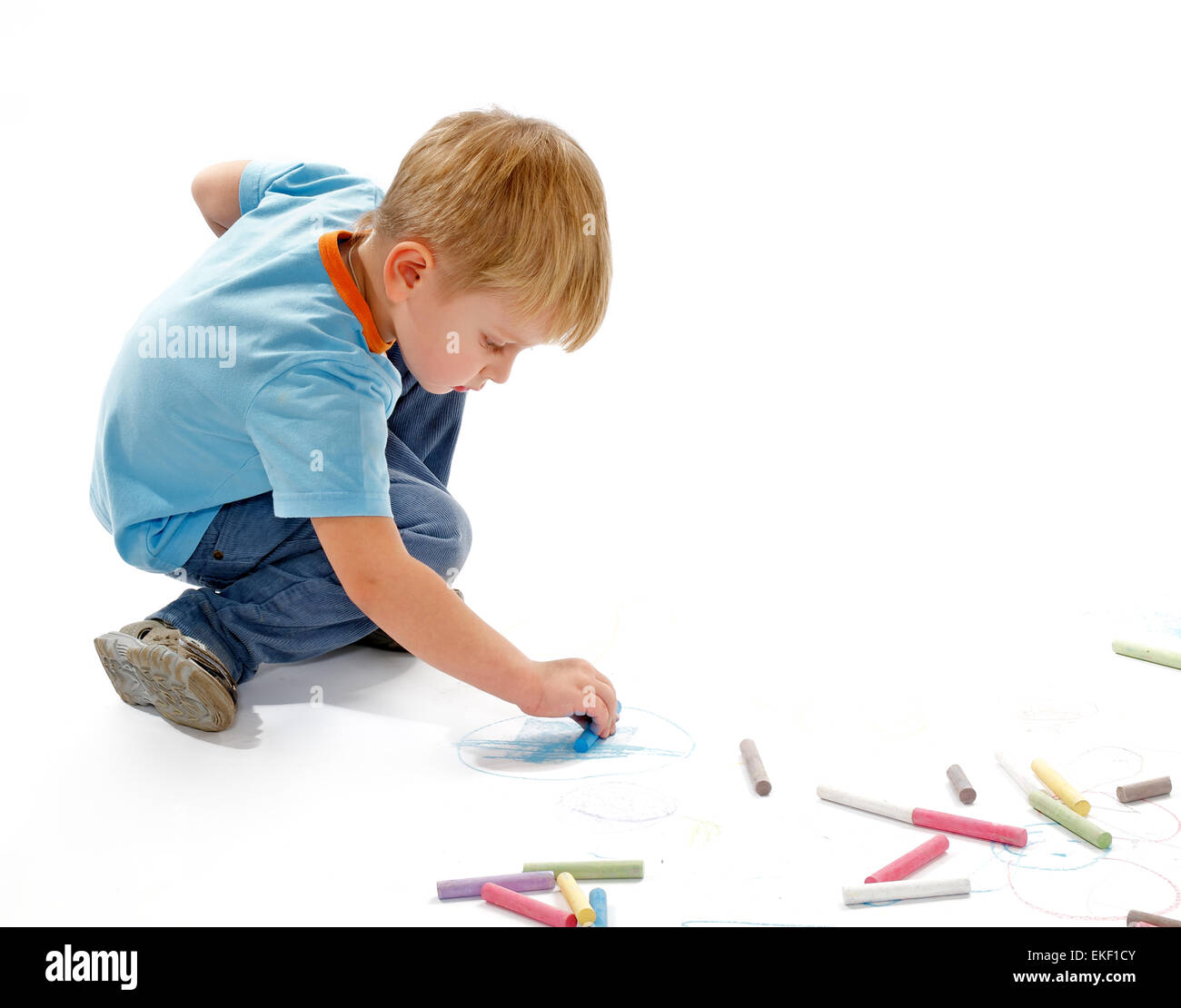 Boy Drawing with Chalk Stock Photo - Alamy
