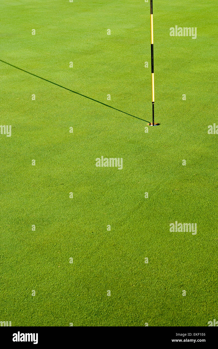 Flag and hole Stock Photo - Alamy