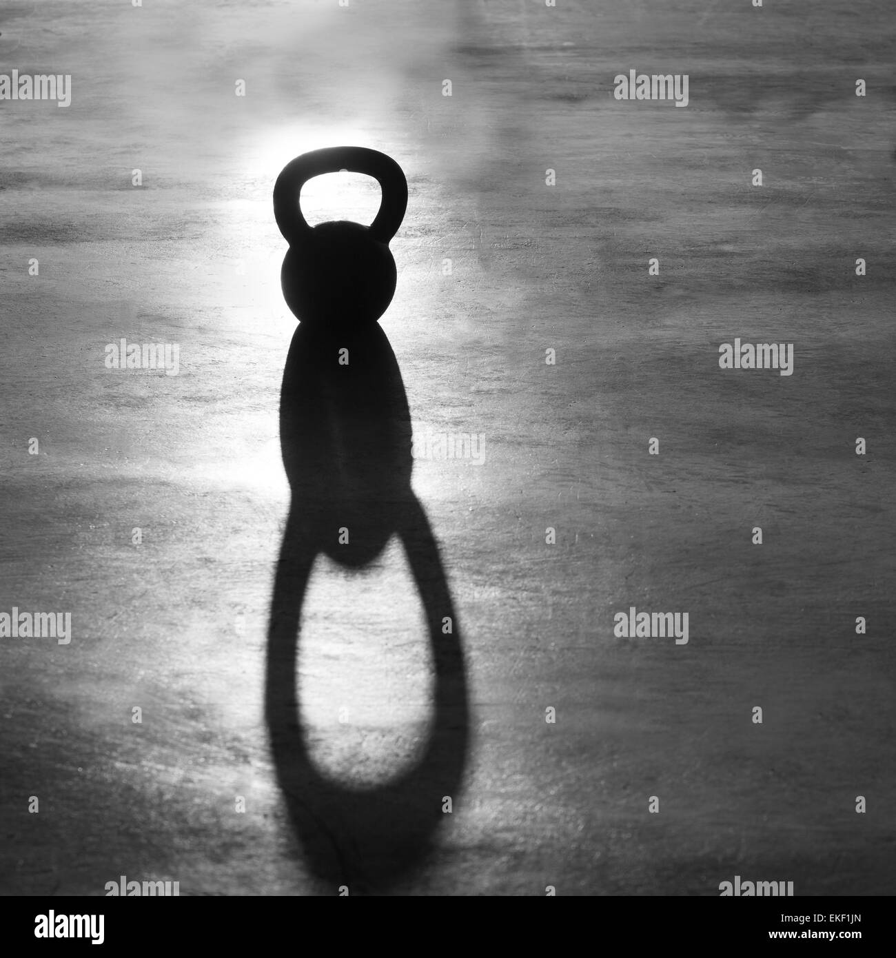 Crossfit Kettlebell weight backlight and shadow Stock Photo - Alamy