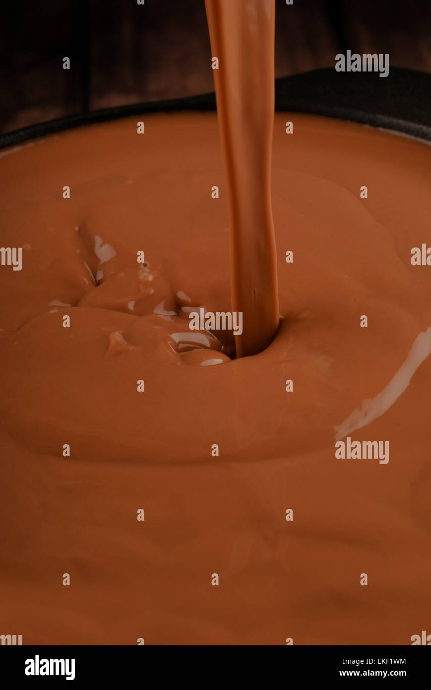 Pouring melted chocolate hi-res stock photography and images - Alamy