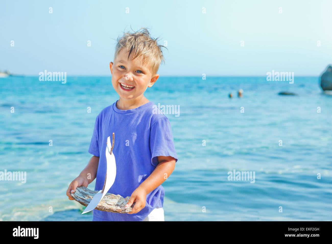 boy with toy ship Stock Photo - Alamy
