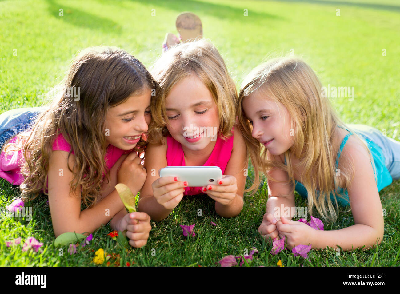 children friend girls playing internet with smartphone Stock Photo - Alamy