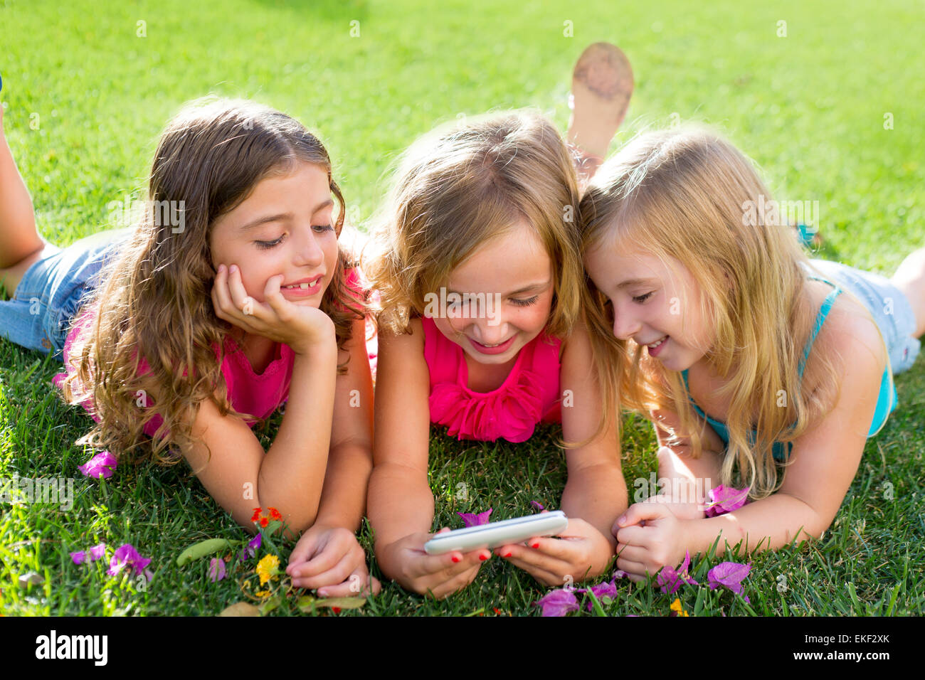 children friend girls playing internet with smartphone Stock Photo - Alamy