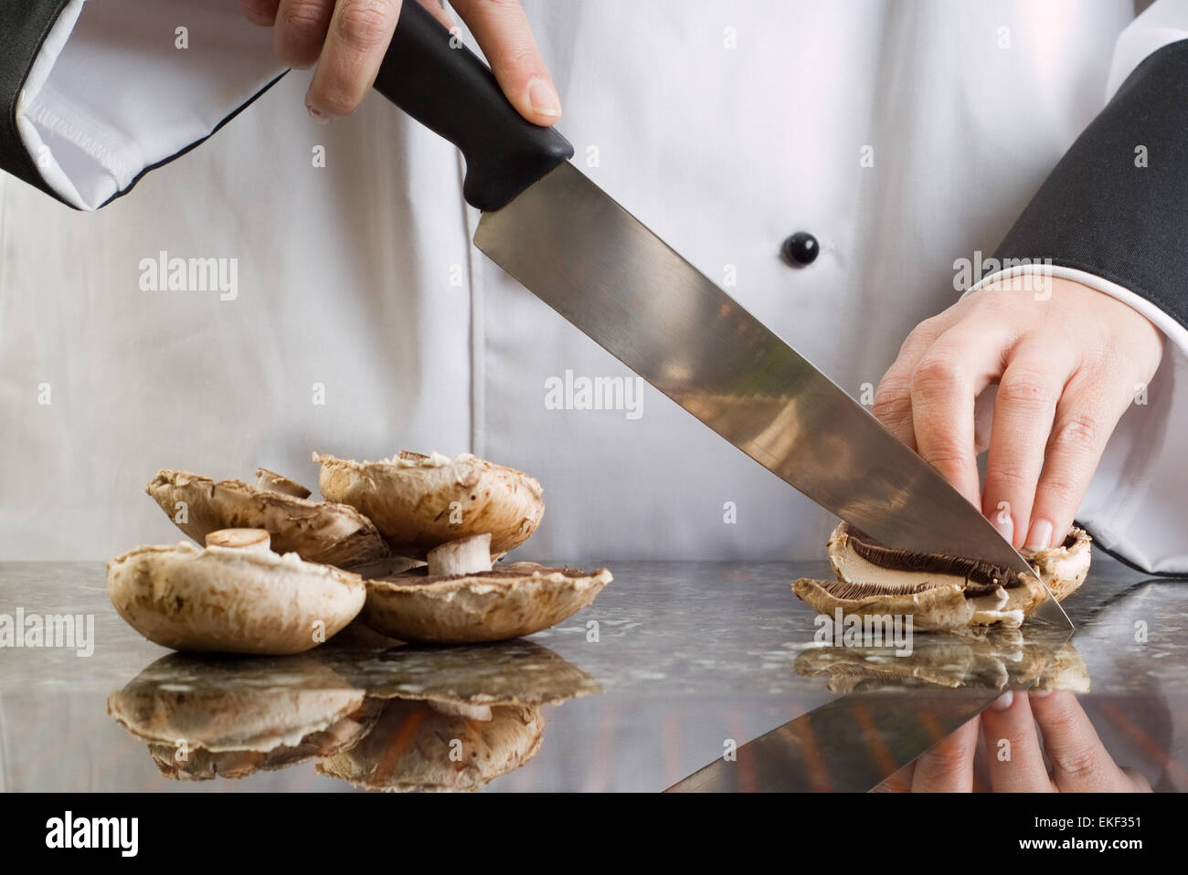 Chef Cutting Brown Mushrooms Stock Photo - Alamy