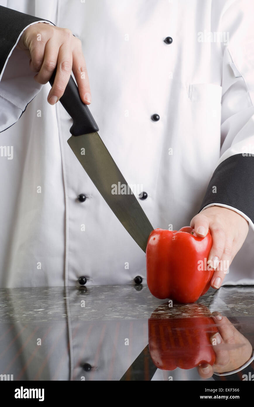 Chef Cutting Red Pepper Stock Photo - Alamy