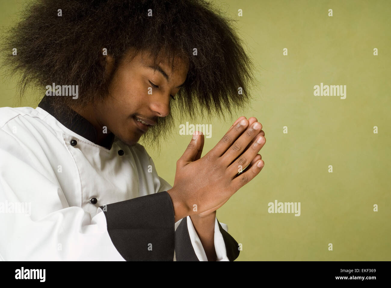 Young Chef Praying Stock Photo - Alamy