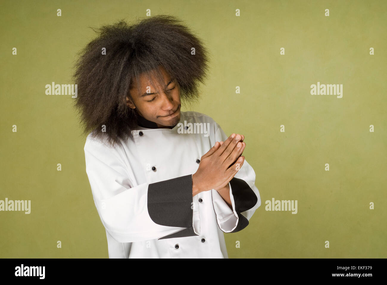 Young Chef Praying Stock Photo - Alamy
