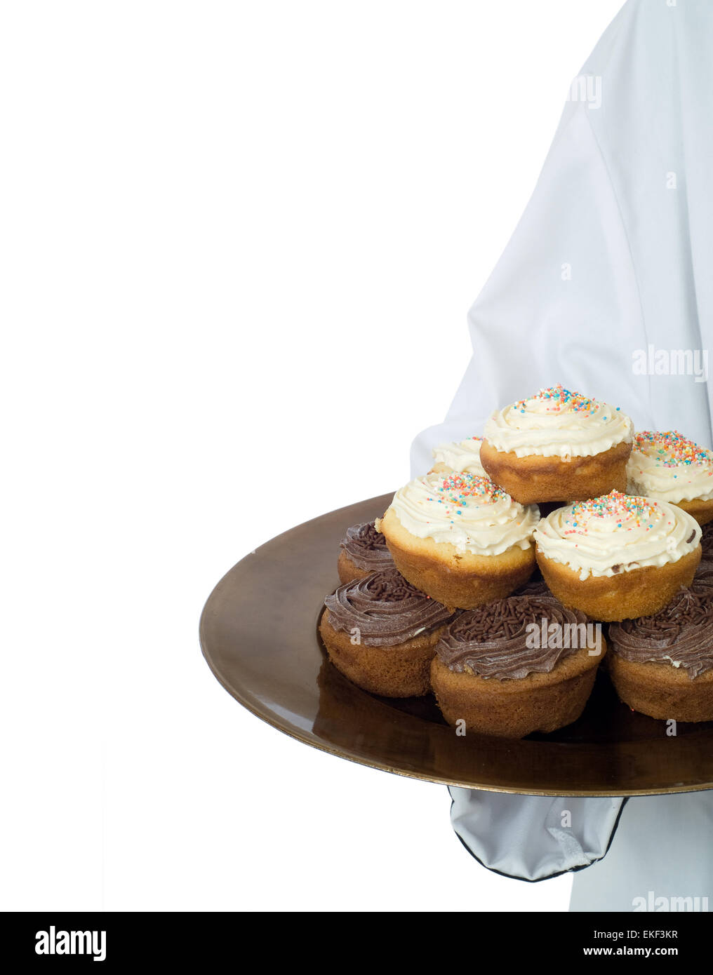 Chef or waiter serving cupcakes Stock Photo - Alamy